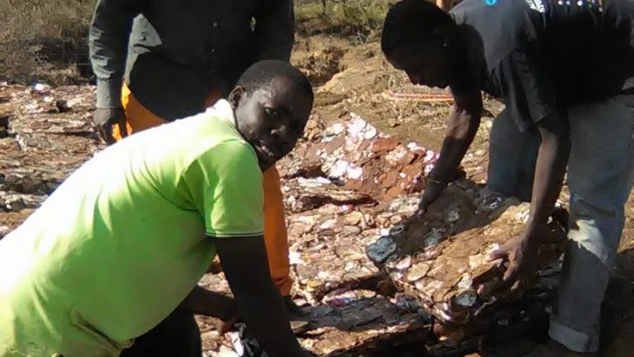 Baling out the community of Xigalo Village using compressed scrap as ...