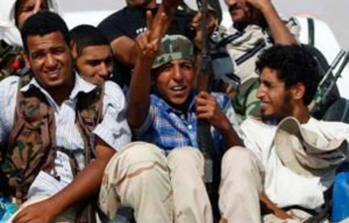 Libya rebels get taste of luxury at Gaddafi family resort – The Mail ...