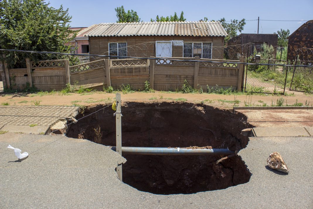 Khutsong residents ‘living in a danger zone’ amid sinkholes and sewage ...