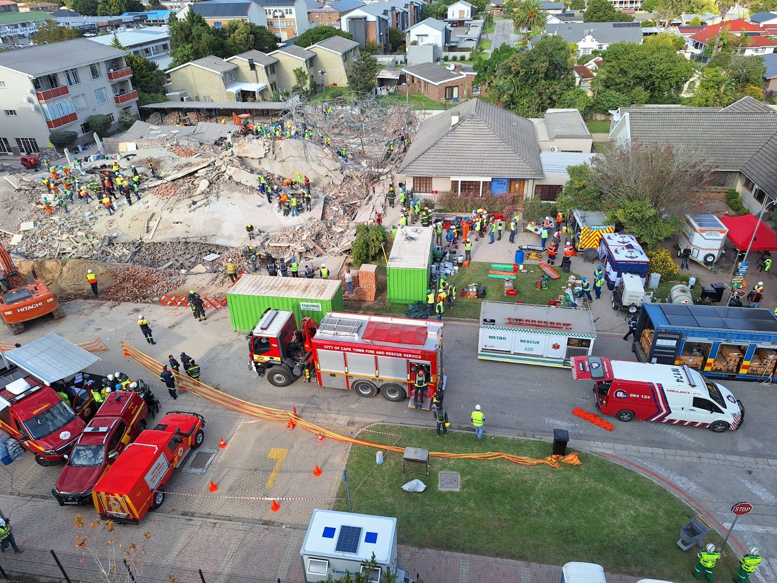 Six people die in George building collapse, 48 trapped under rubble ...